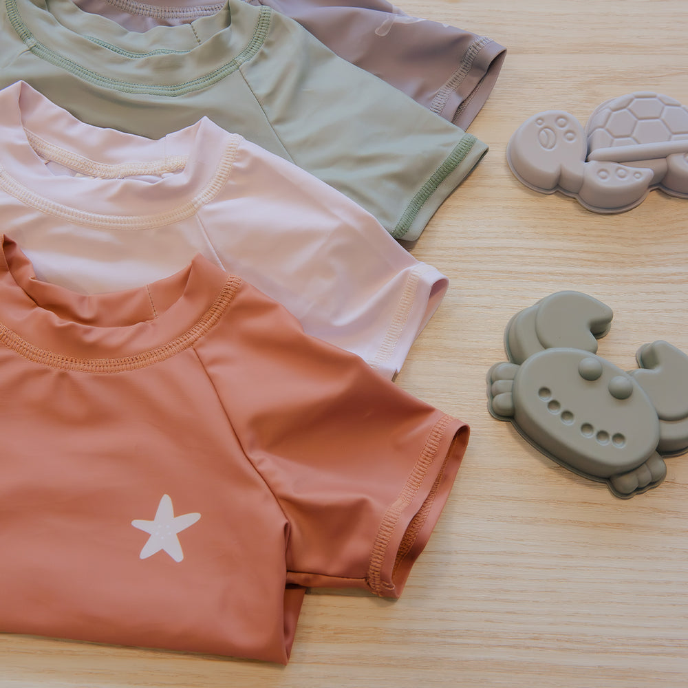 Pull d'eau UV : Protégez vos bébés du soleil – La Petite Ourse